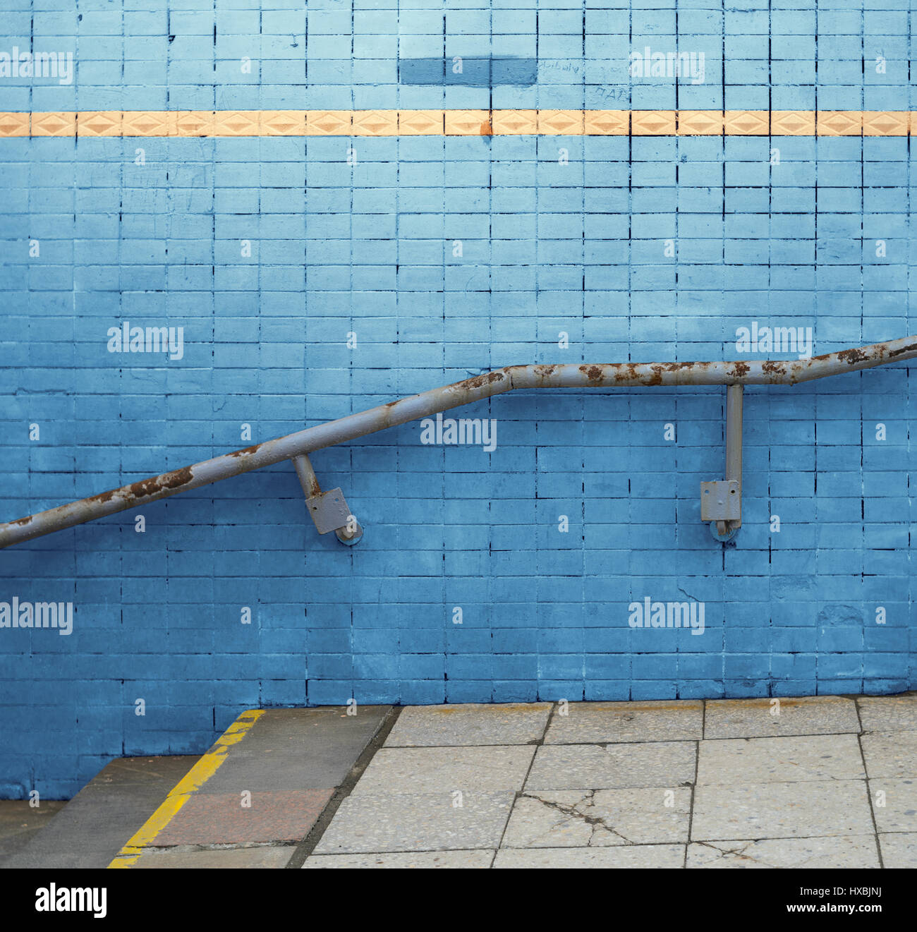 Painted Tile Wall Texture with Metal Railing for Background or Copy ...