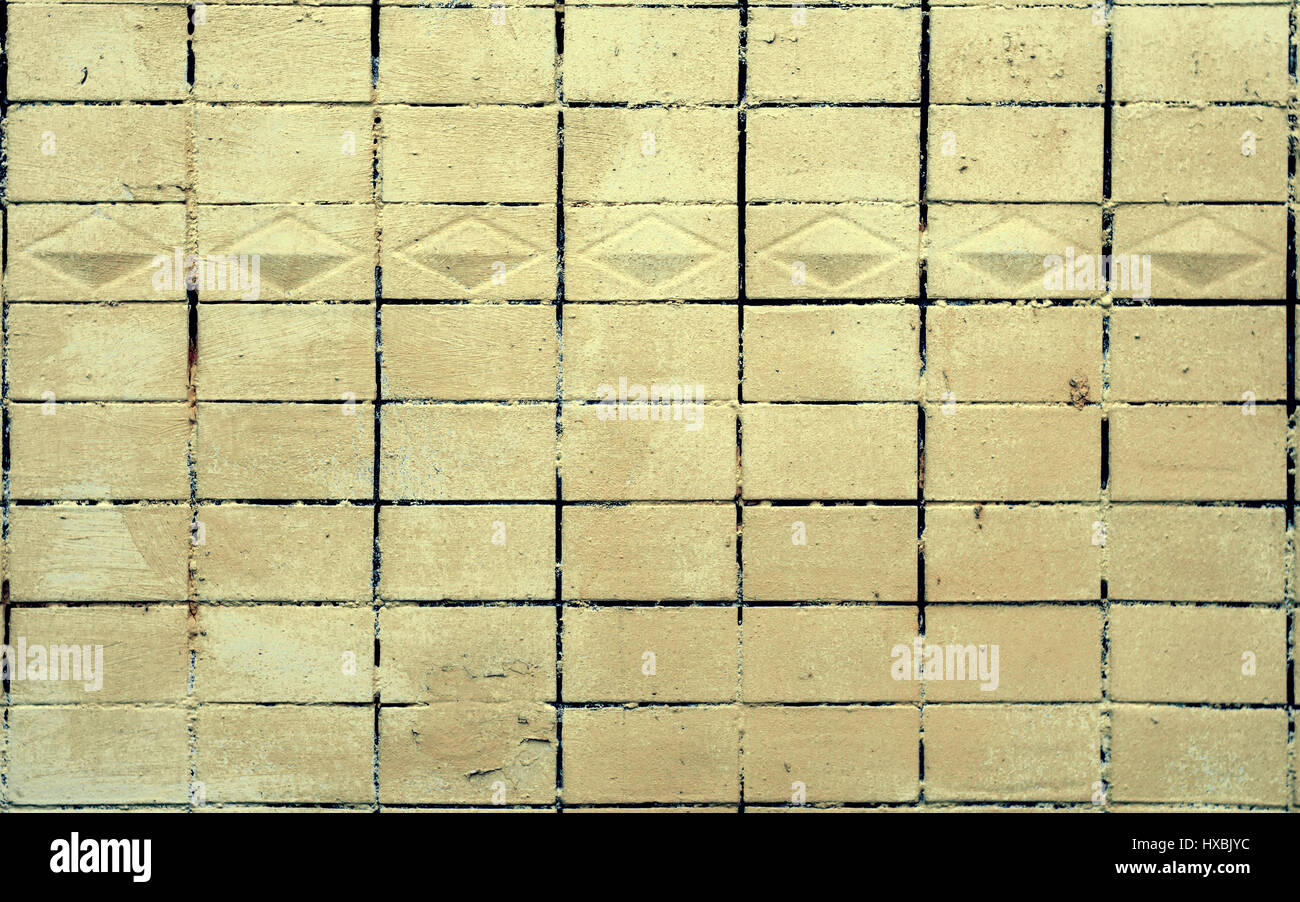 Old Tile Wall Texture Painted in Yellow for Background or Copy Space ...