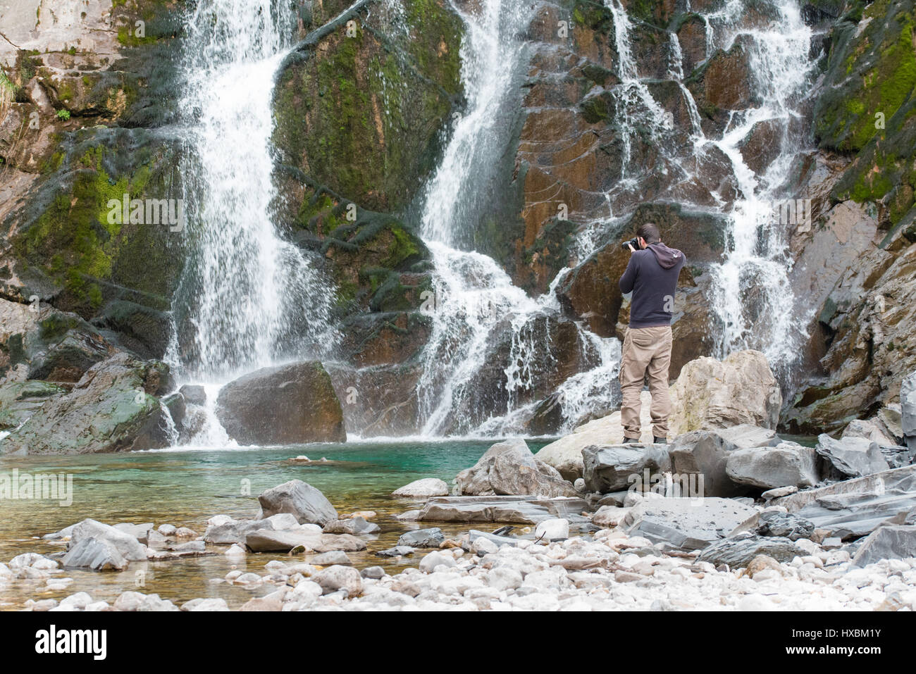 Emerald water and waterfalls Stock Photo - Alamy