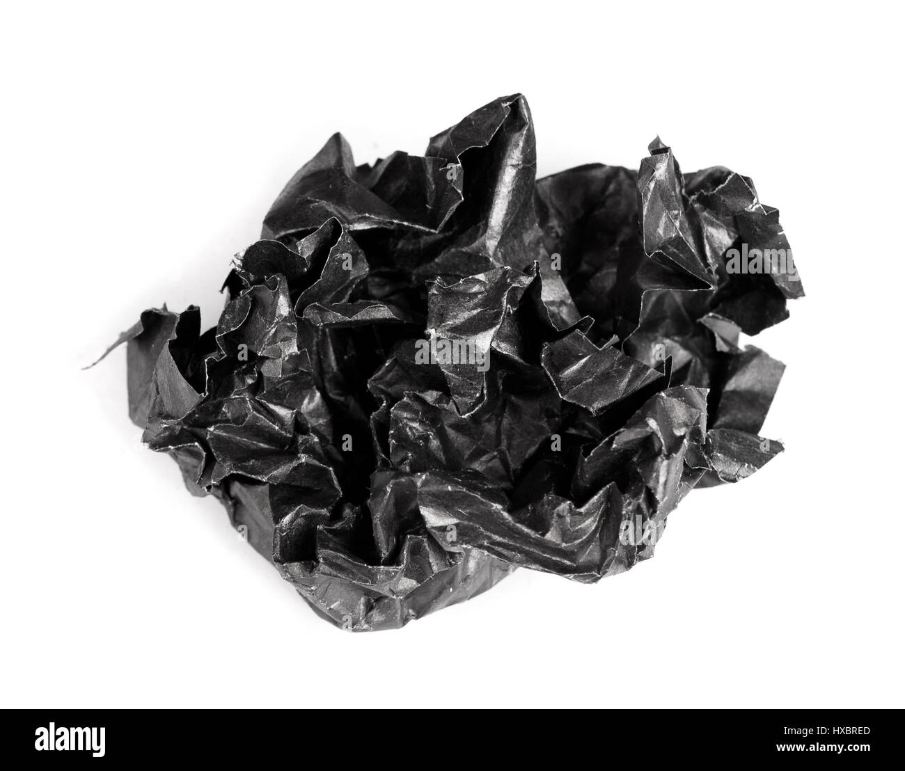 Screwed up piece of black paper isolated on white background Stock ...