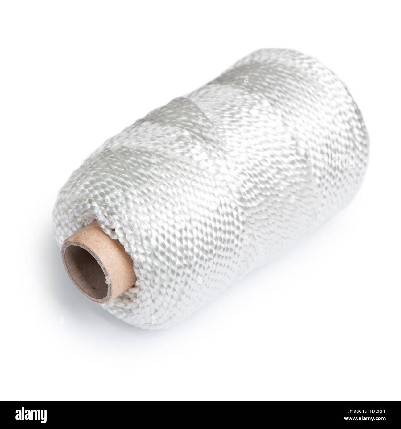 Spool of thread isolated on white background Stock Photo - Alamy