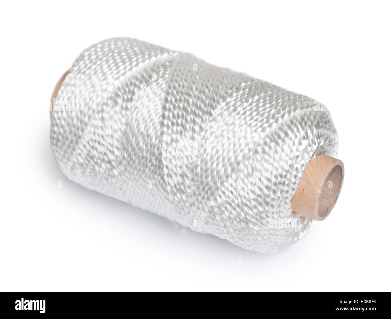 Spool of thread isolated on white Stock Photo - Alamy