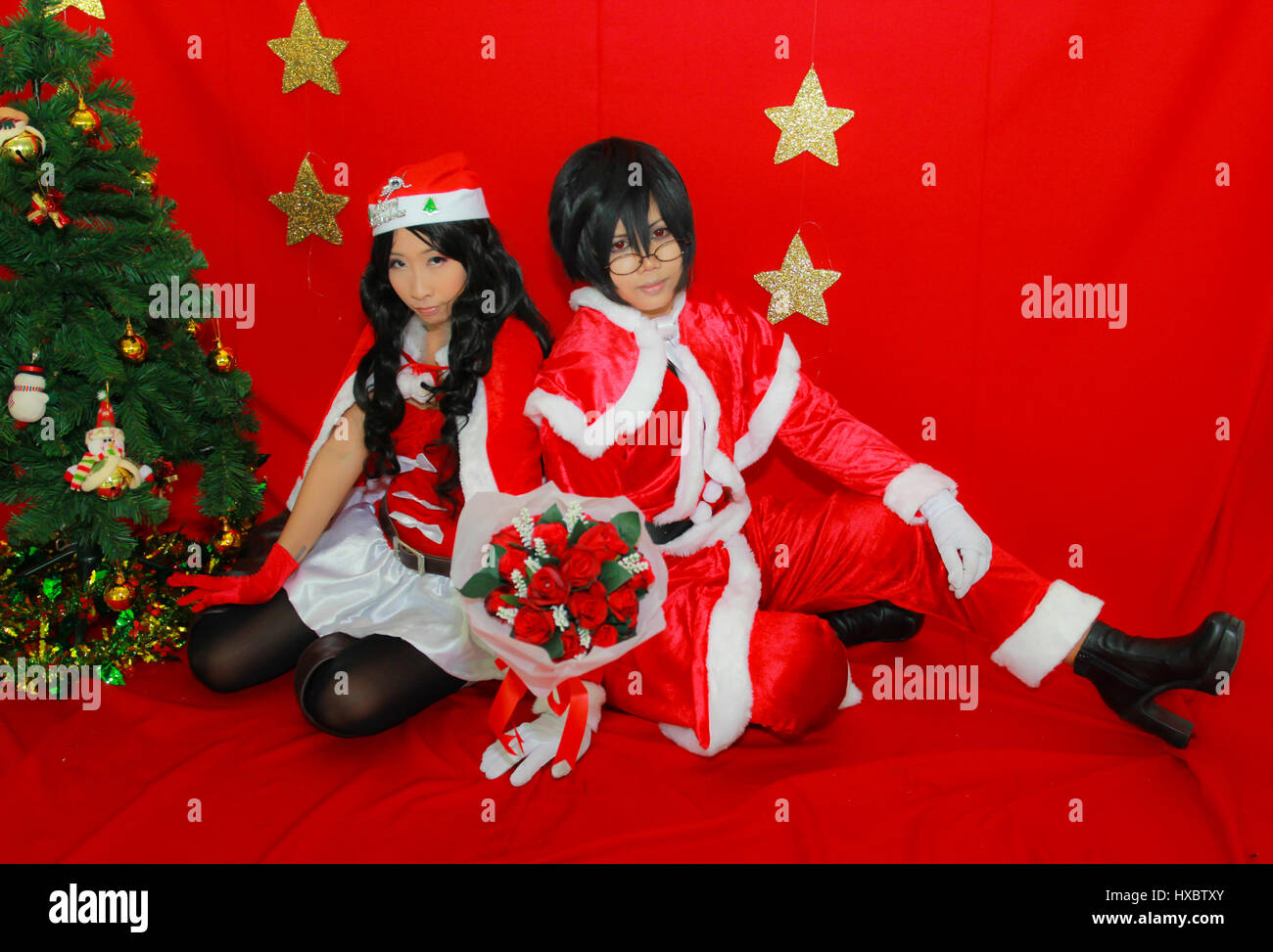 Bangkok - Dec 28: An unidentified Japanese anime cosplay pose in COSCOM ...