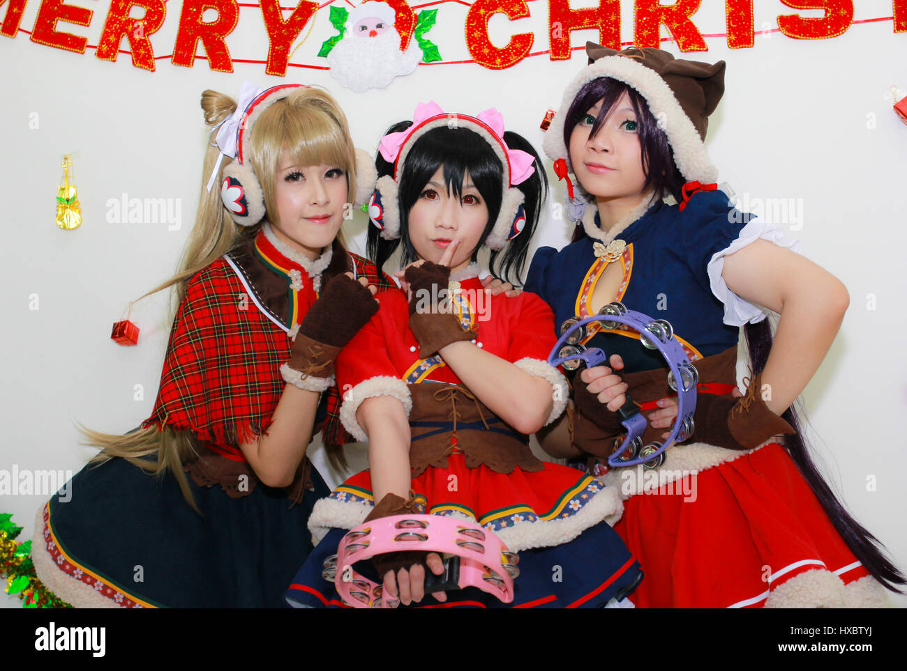 Bangkok - Dec 28: An unidentified Japanese anime cosplay pose in COSCOM ...