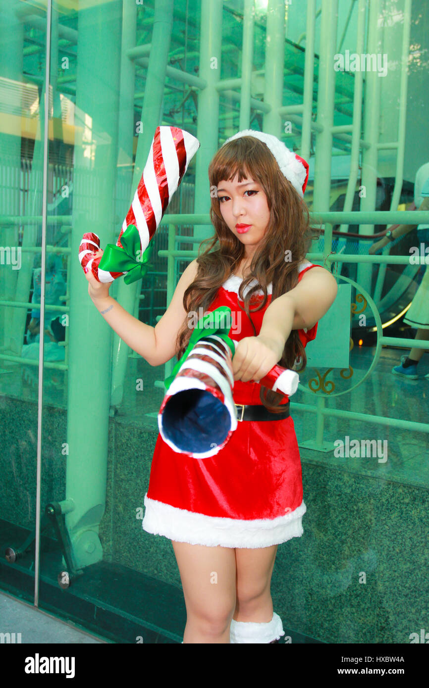 Bangkok - Dec 28: An unidentified Japanese anime cosplay pose in COSCOM ...