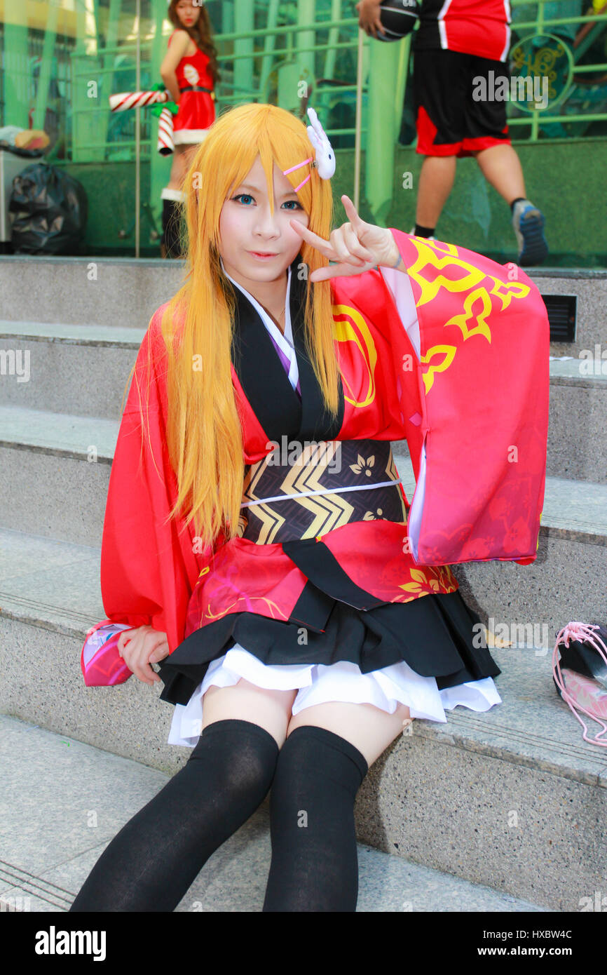 Bangkok - Dec 28: An unidentified Japanese anime cosplay pose in COSCOM ...
