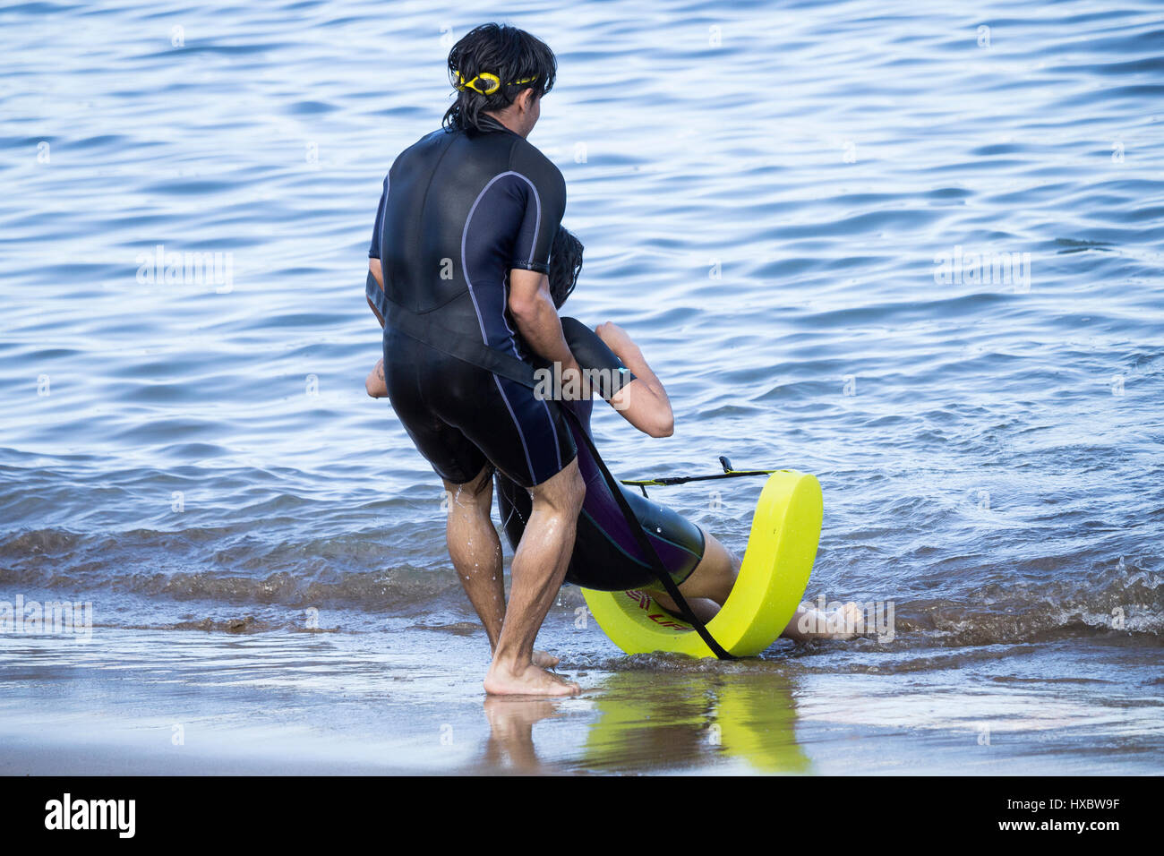 Lifeguard training on beach hi-res stock photography and images - Alamy