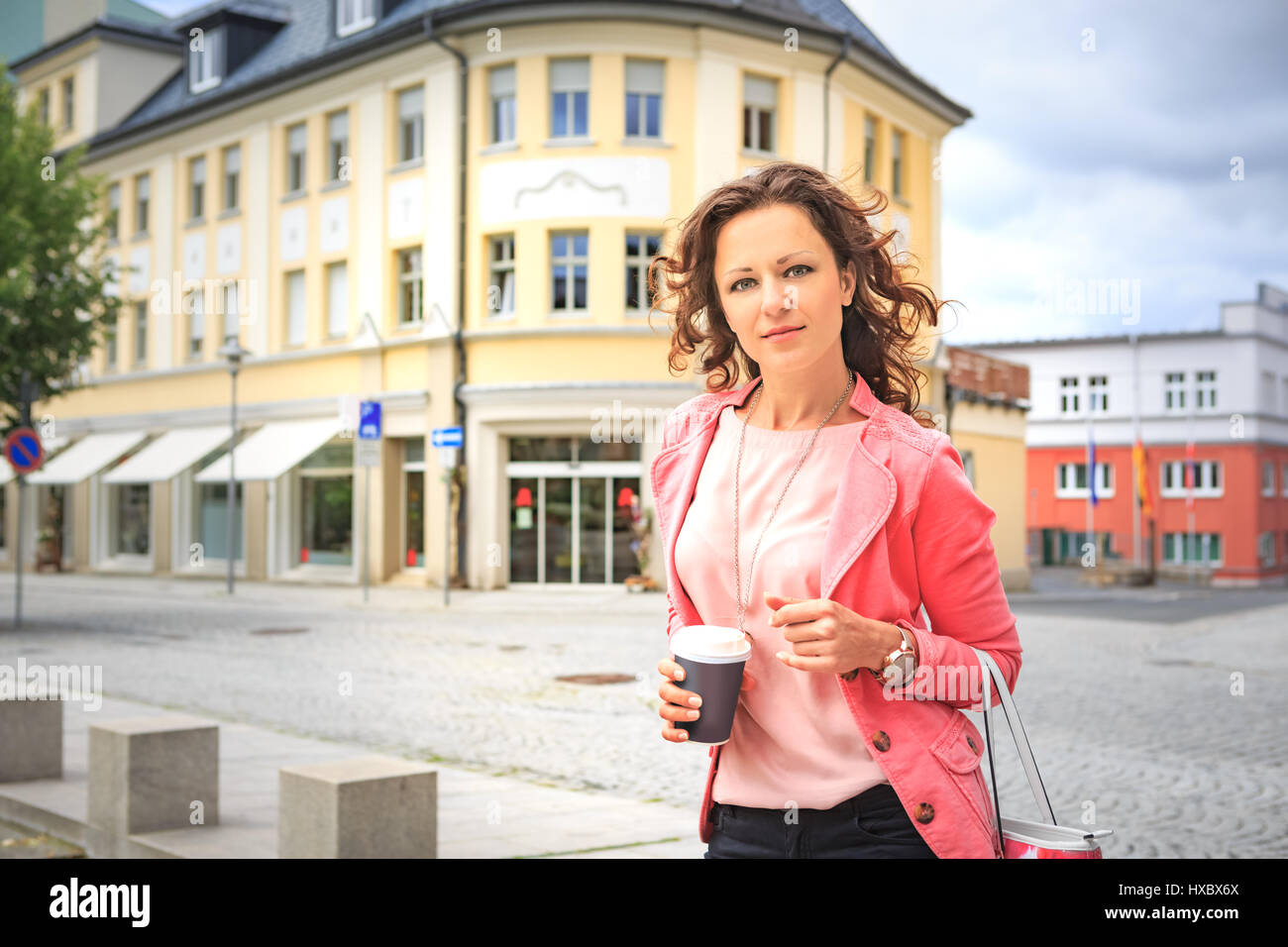 portrait of a young woman on the town street Stock Photo - Alamy