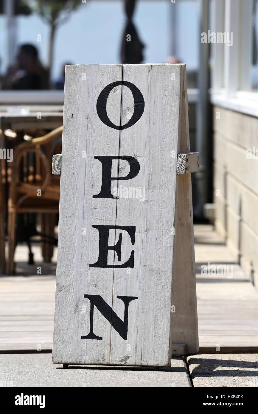 wooden stand-up sign OPEN Stock Photo - Alamy