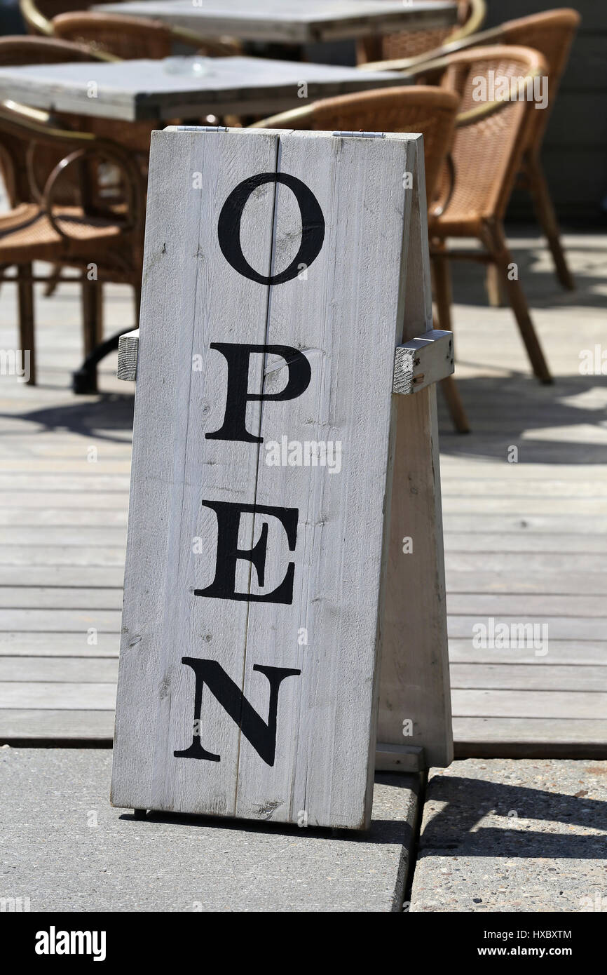wooden stand-up sign OPEN Stock Photo - Alamy