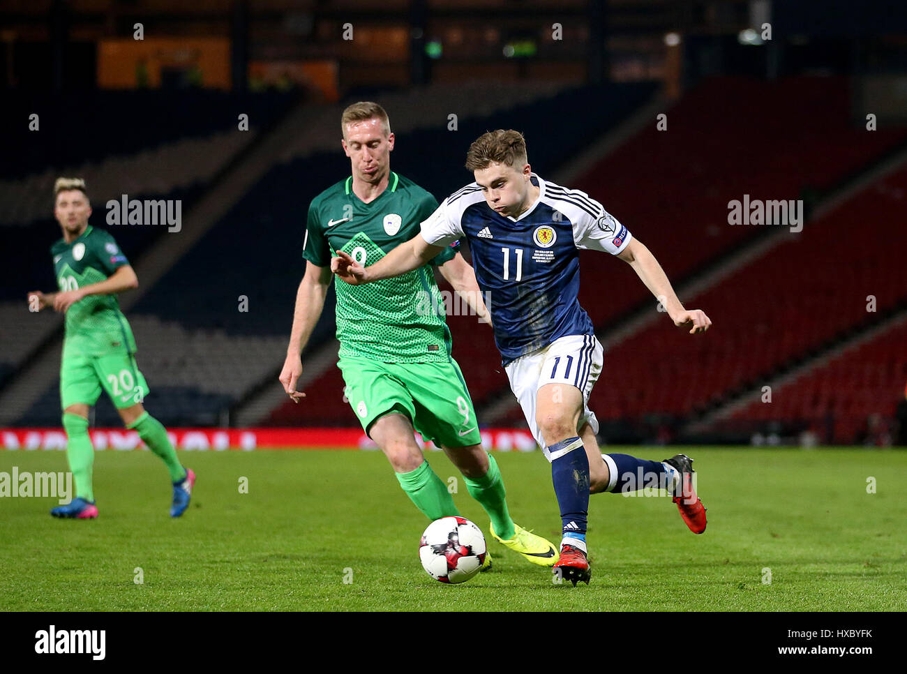 Slovenia's Robert Beric (left) and Scotland's James Forrest (right ...