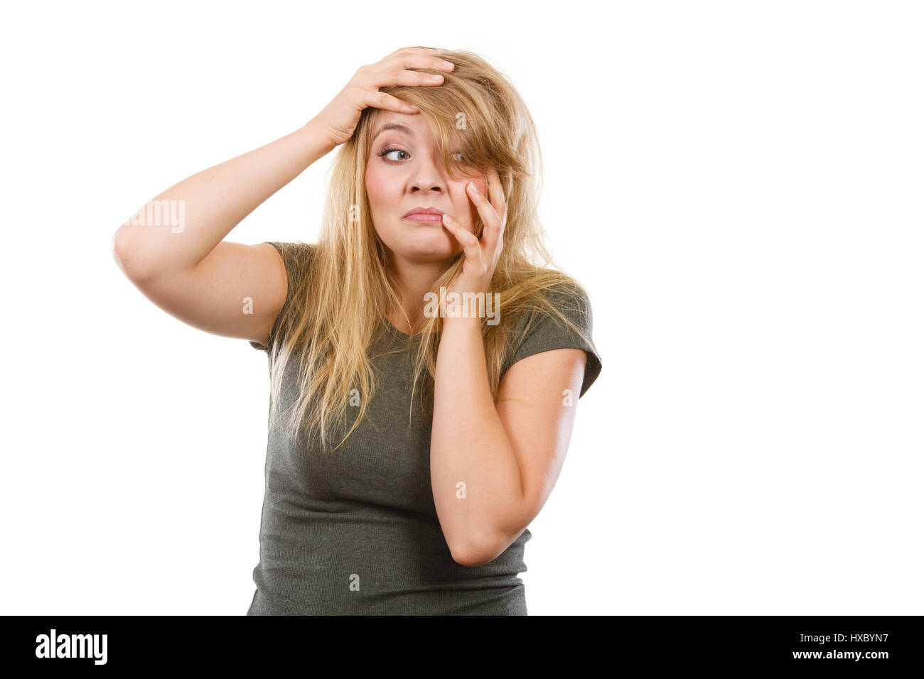 Emotions, embarrassment, awkwardness gestures concept. Ashamed blonde ...