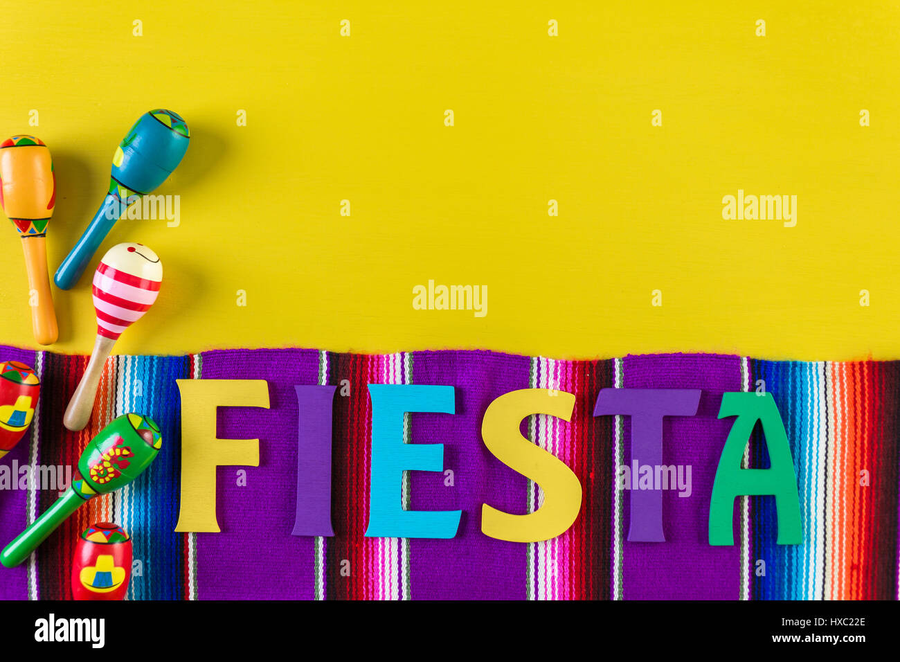 Word Fiesta on a bright painted wood background Stock Photo - Alamy