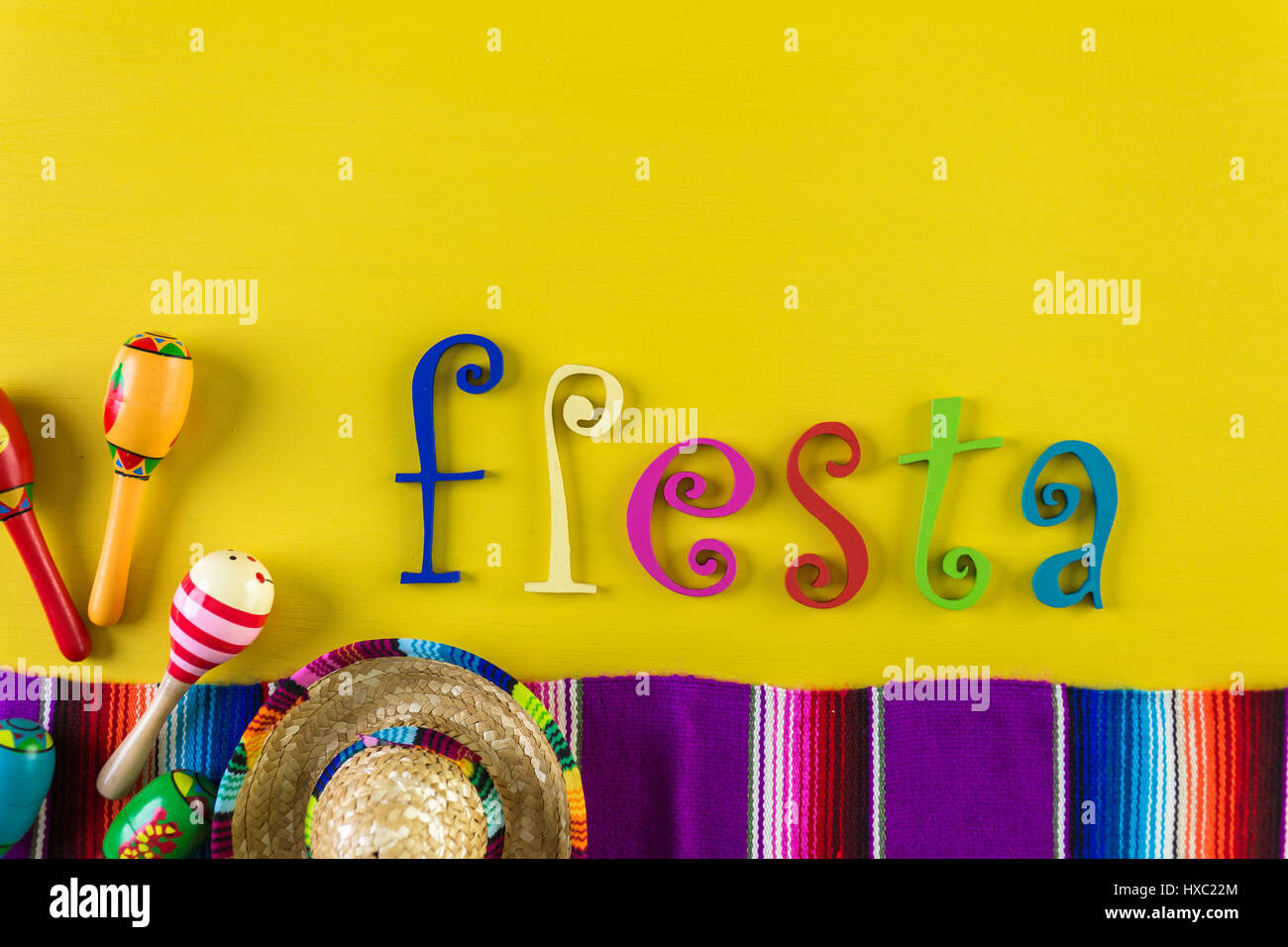Word Fiesta on a bright painted wood background Stock Photo - Alamy