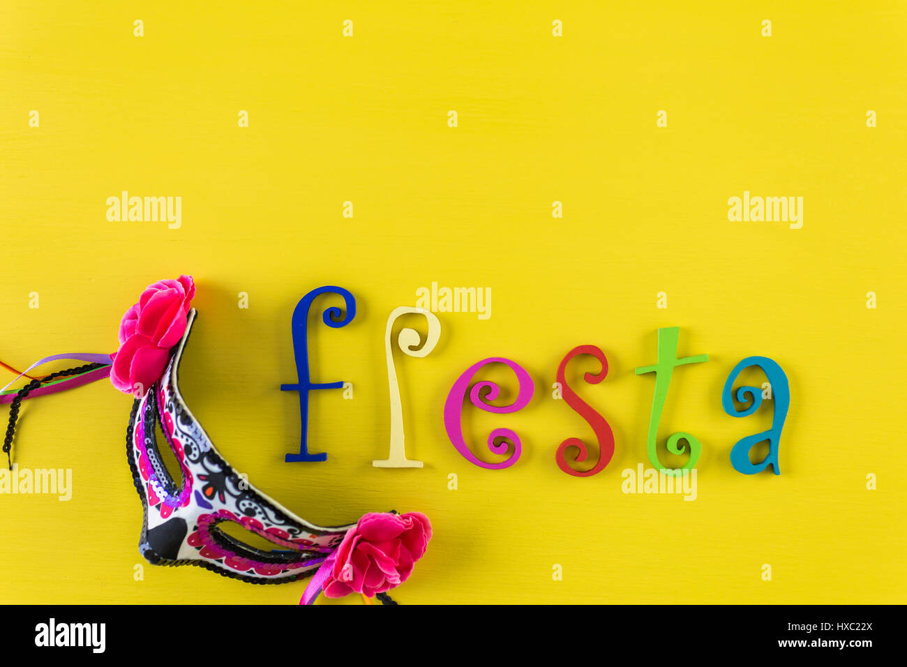 Word Fiesta on a bright painted wood background Stock Photo - Alamy