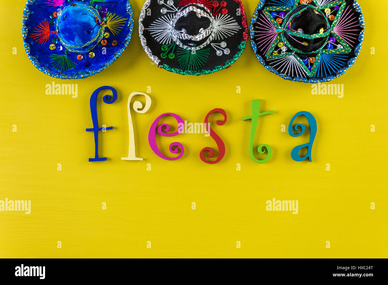 Word Fiesta on a bright painted wood background Stock Photo - Alamy