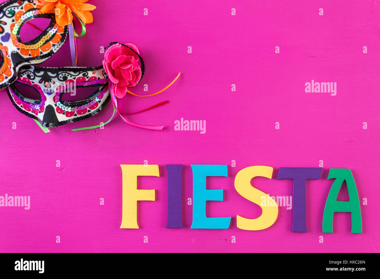 Word Fiesta on a bright painted wood background Stock Photo - Alamy