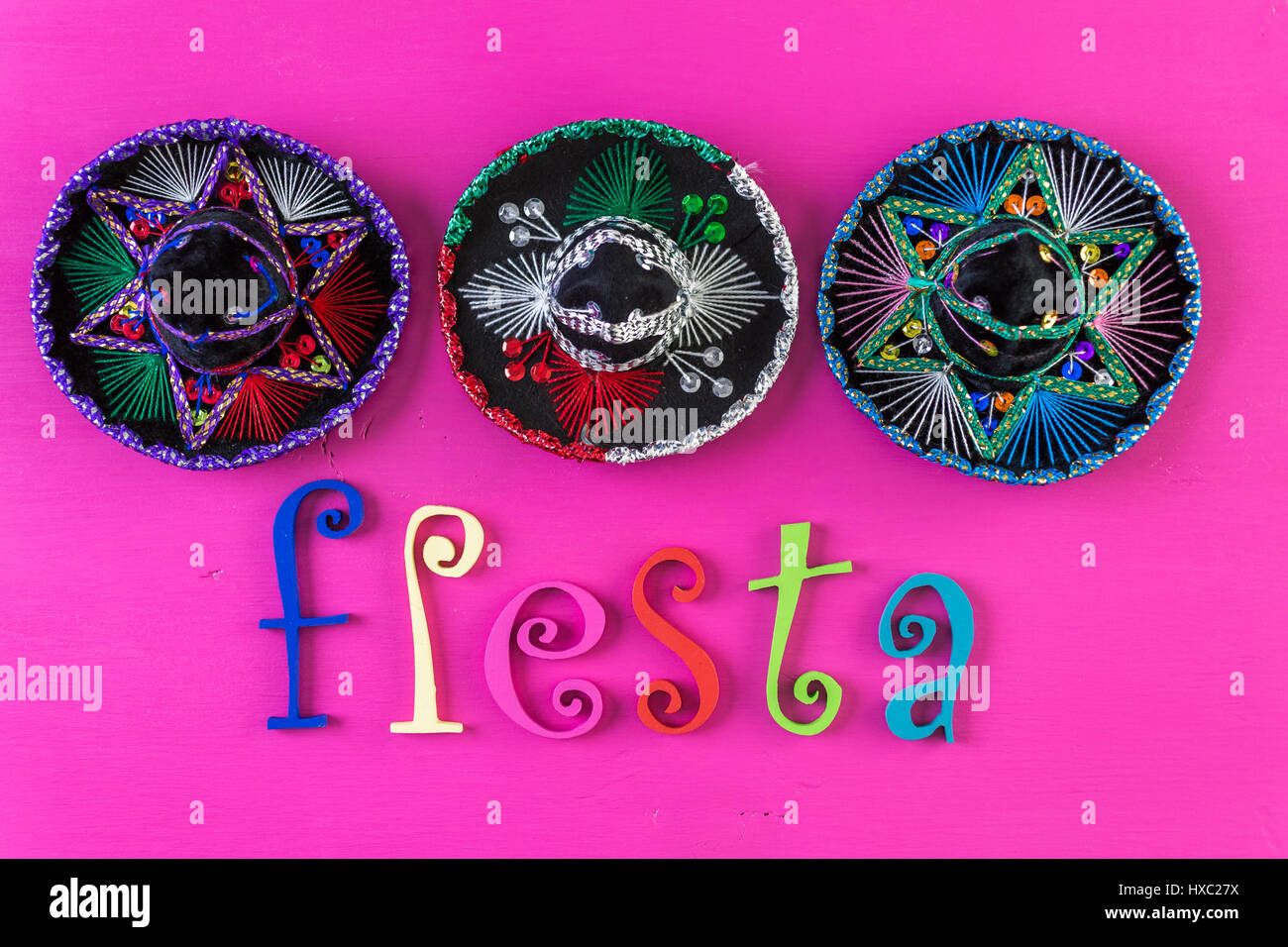 Word Fiesta on a bright painted wood background Stock Photo - Alamy