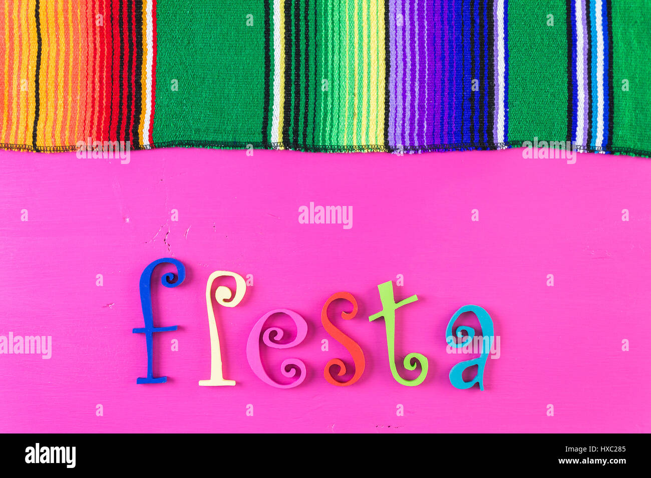 Word Fiesta on a bright painted wood background Stock Photo - Alamy