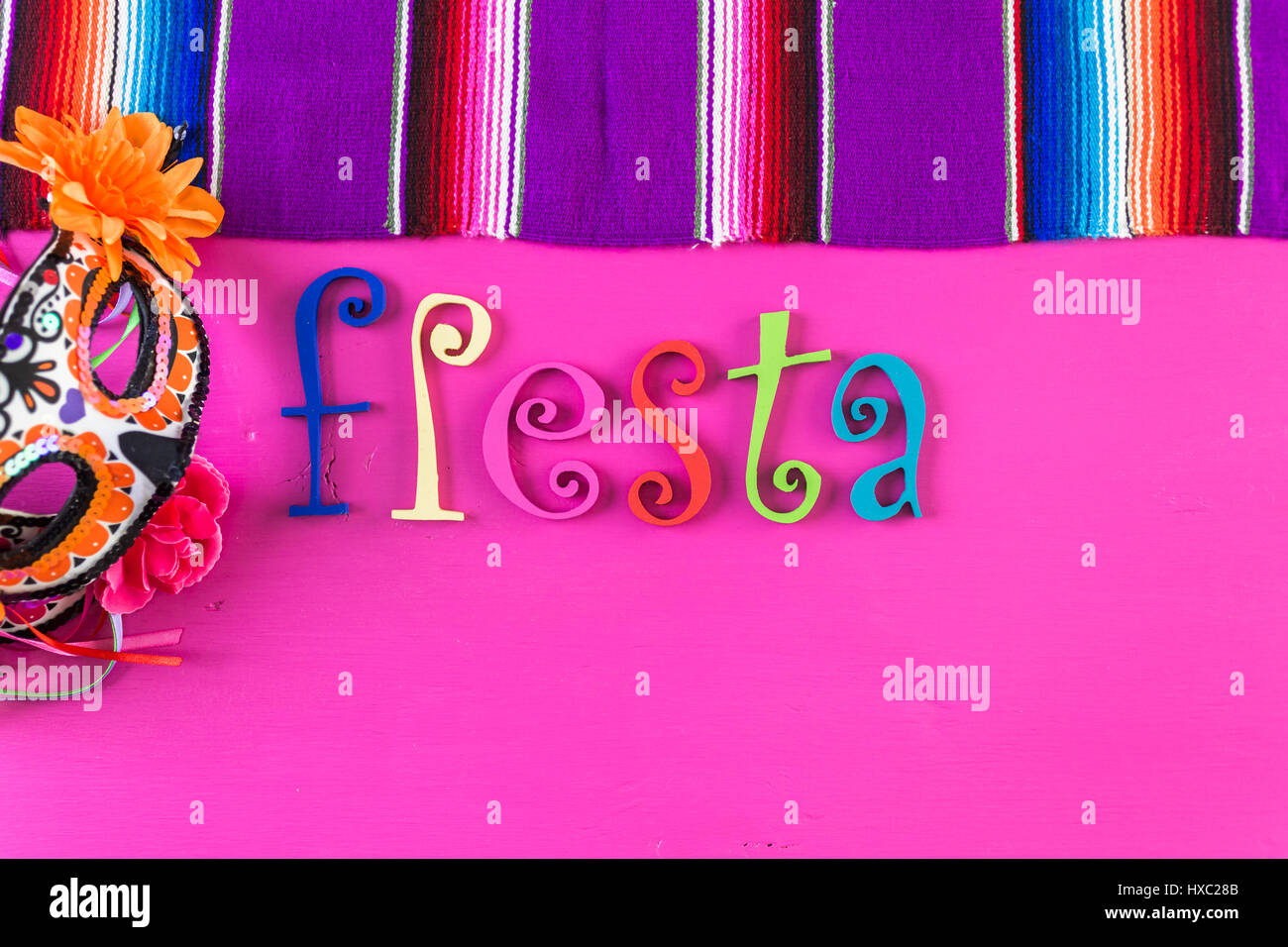 Word Fiesta on a bright painted wood background Stock Photo - Alamy