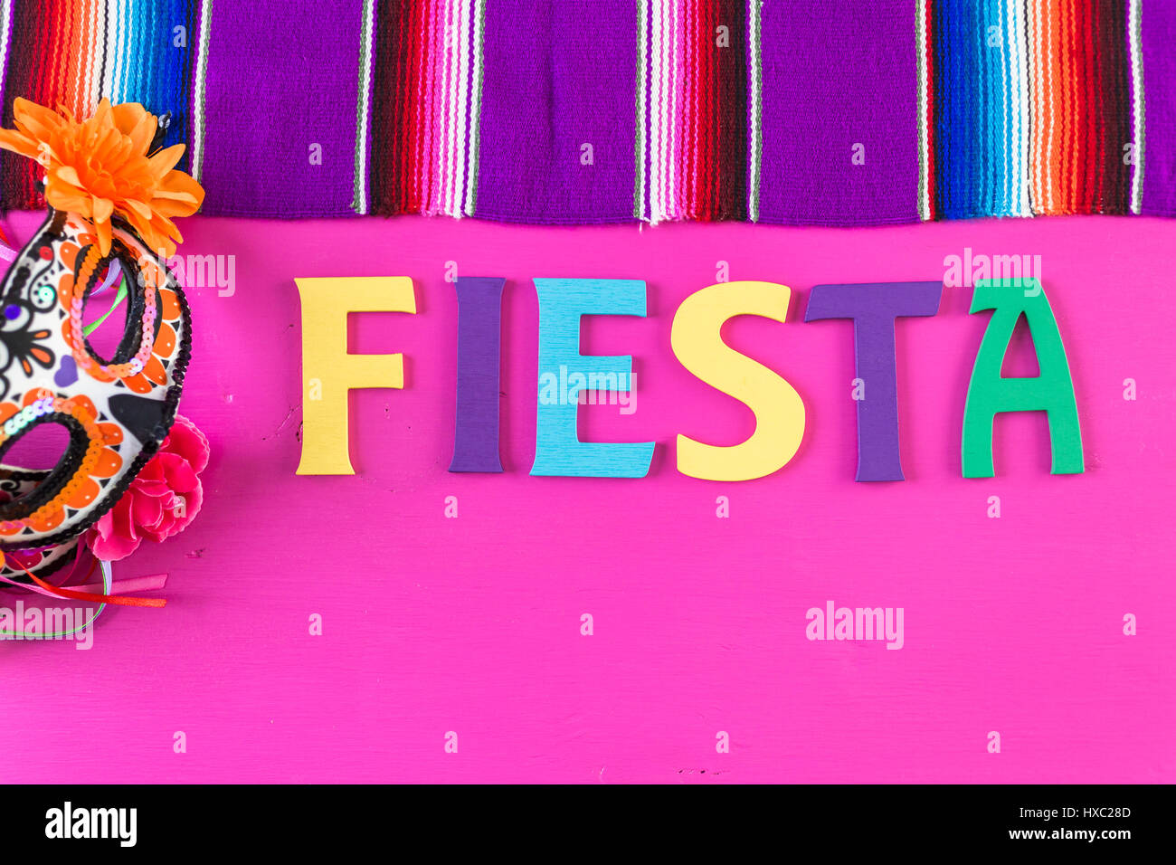 Word Fiesta on a bright painted wood background Stock Photo - Alamy