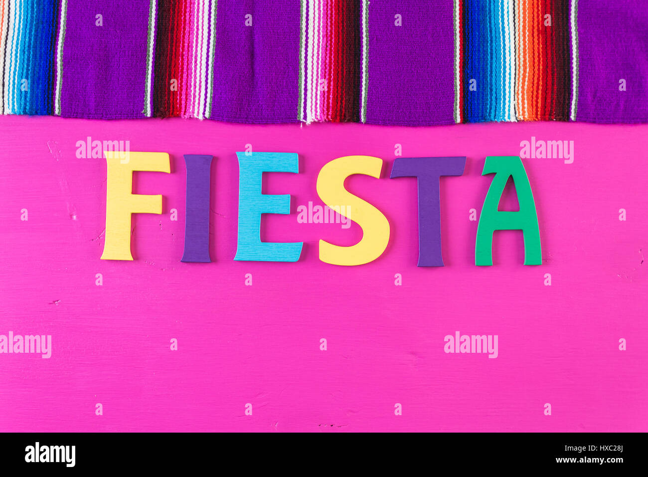 Word Fiesta on a bright painted wood background Stock Photo - Alamy