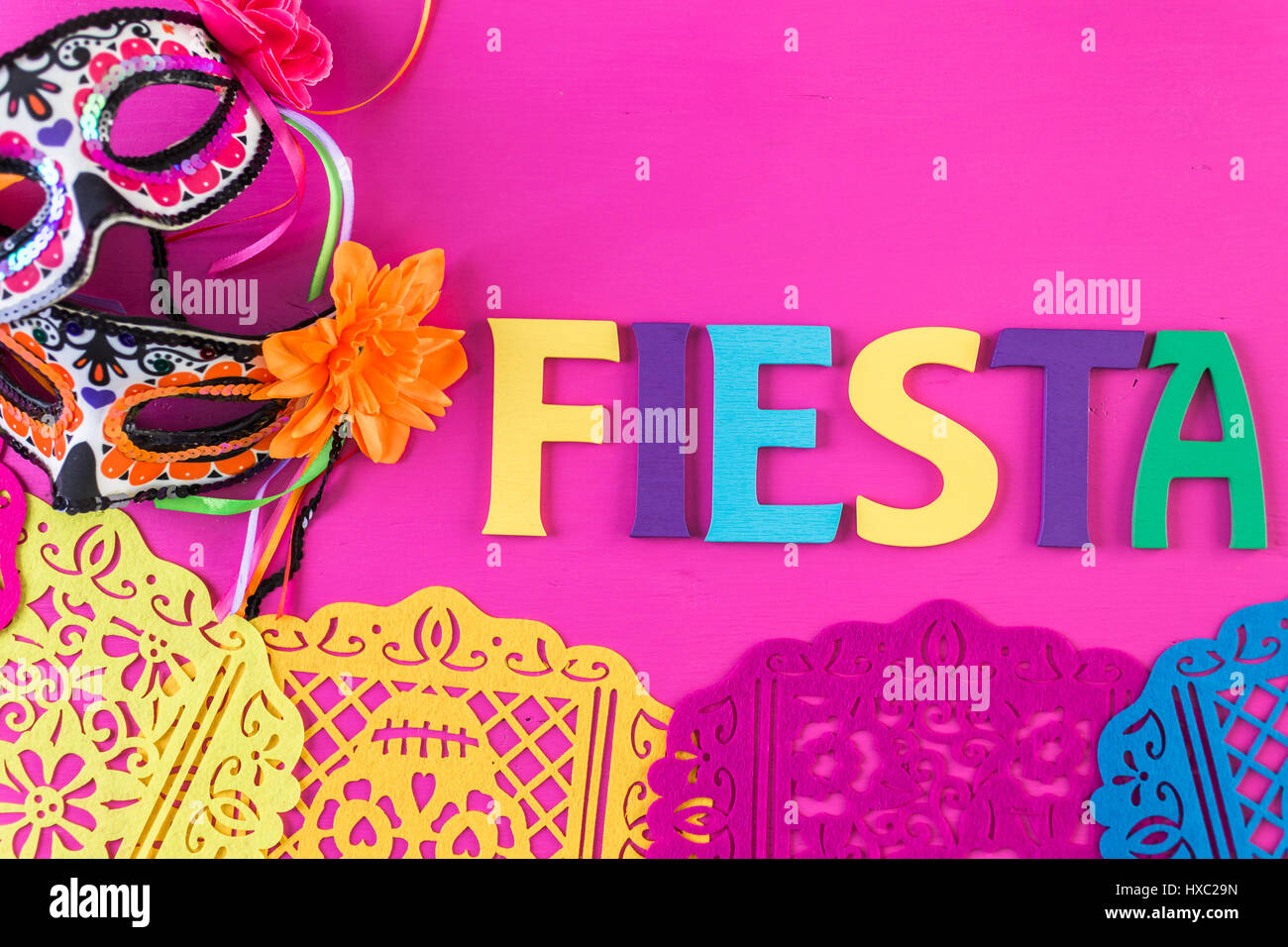 Word Fiesta on a bright painted wood background Stock Photo - Alamy