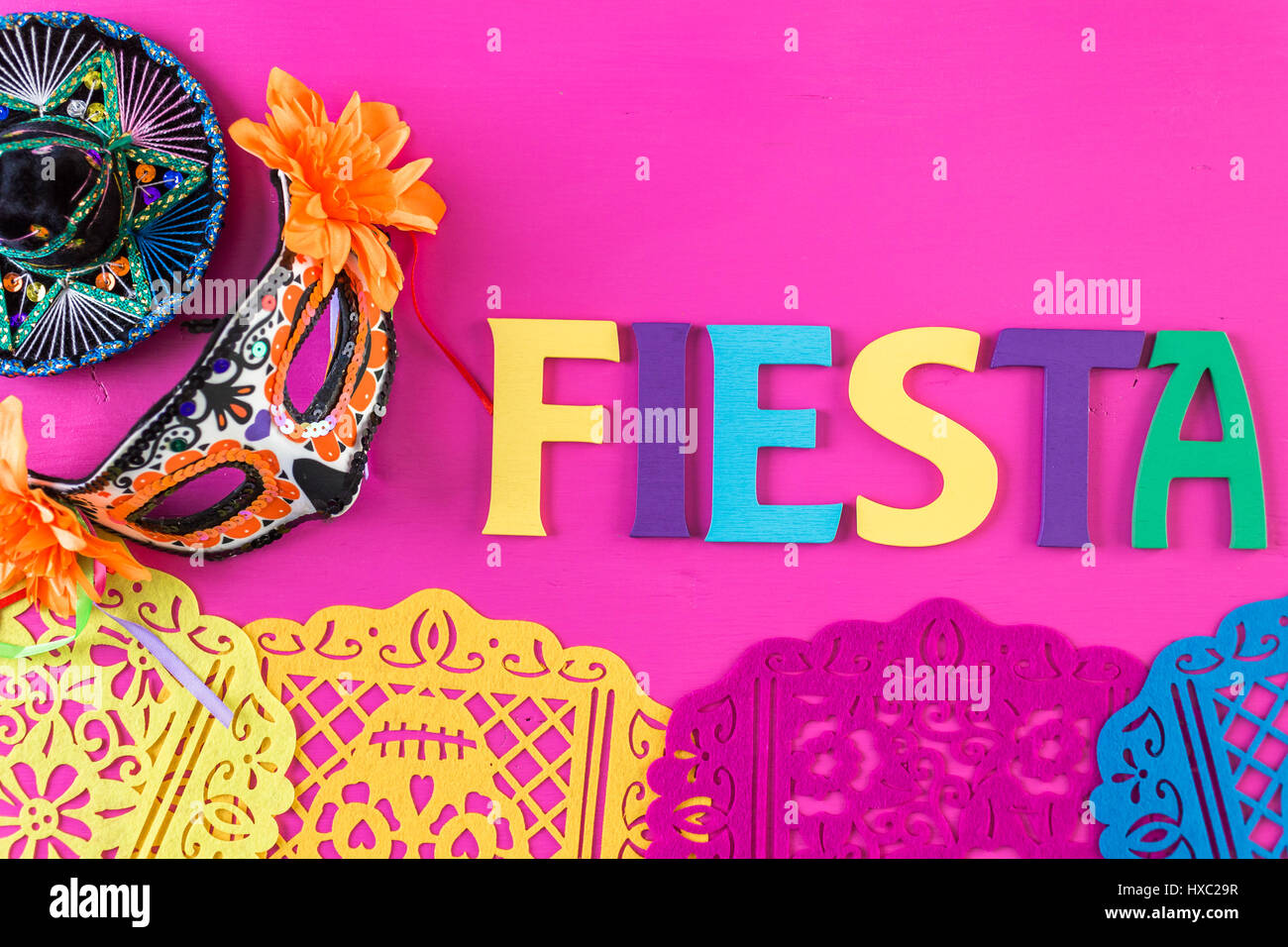 Word Fiesta on a bright painted wood background Stock Photo - Alamy