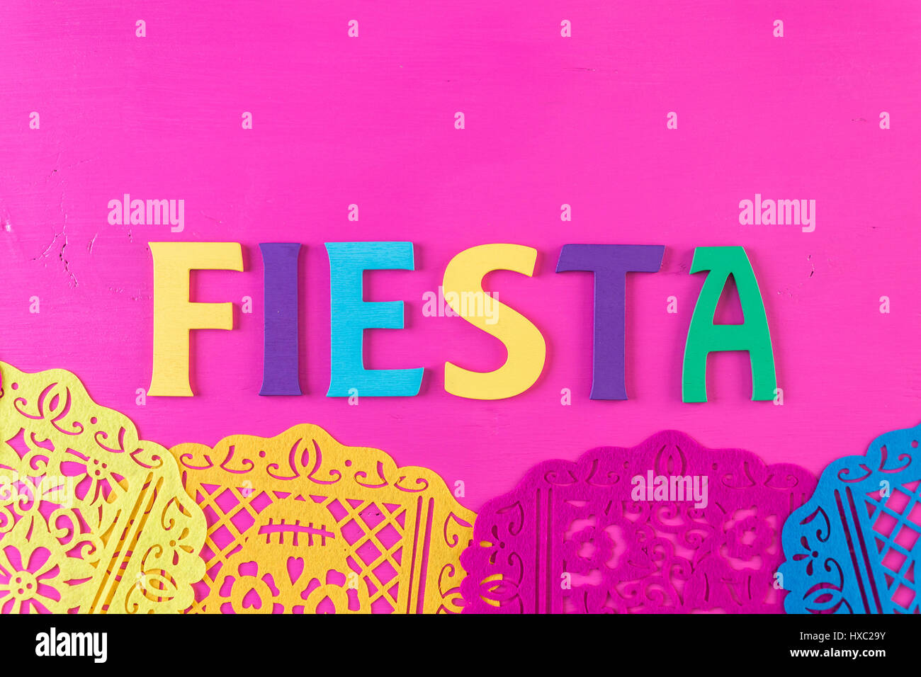 Word Fiesta on a bright painted wood background Stock Photo - Alamy