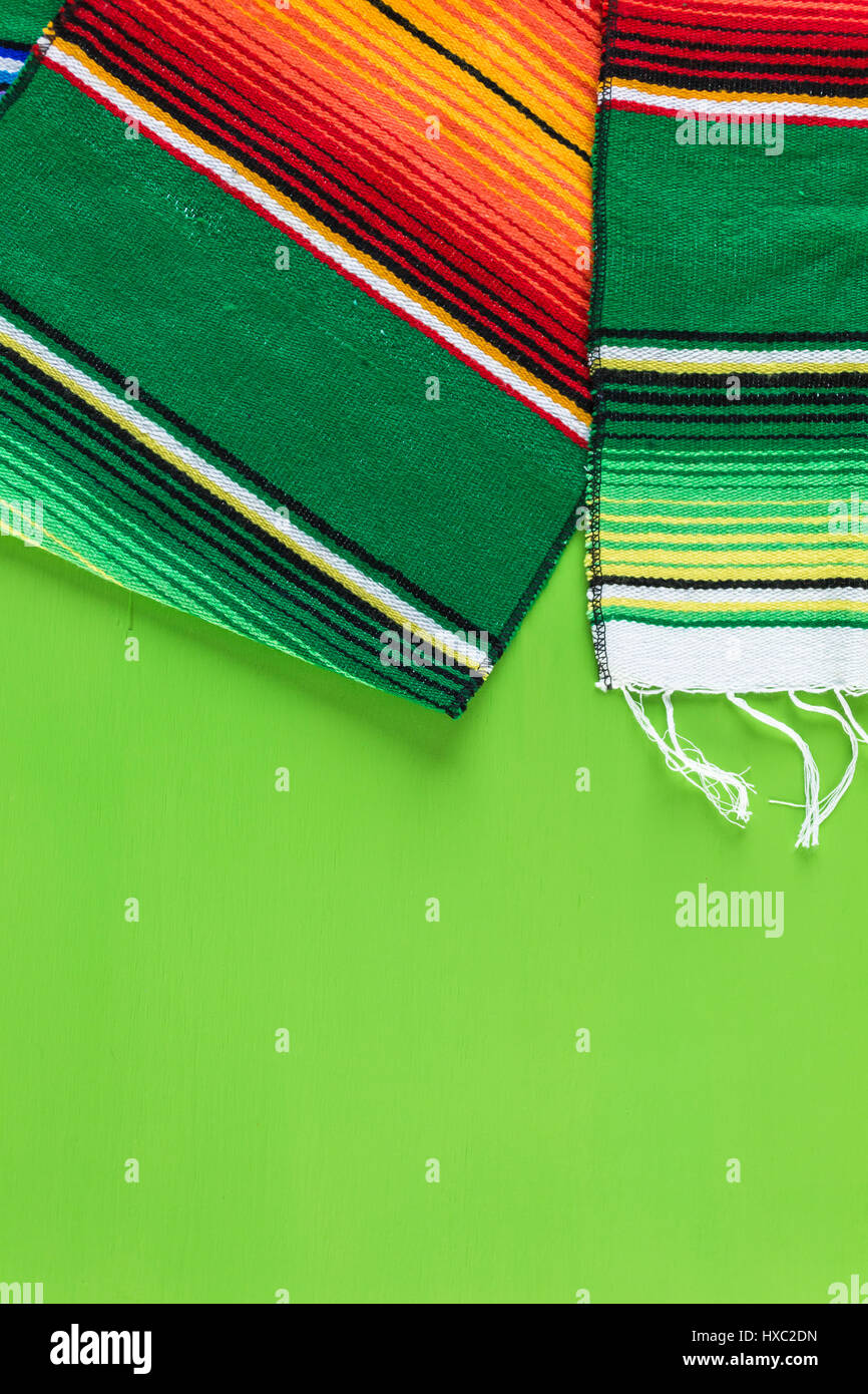 sarape blanket on a bright green background Stock Photo - Alamy