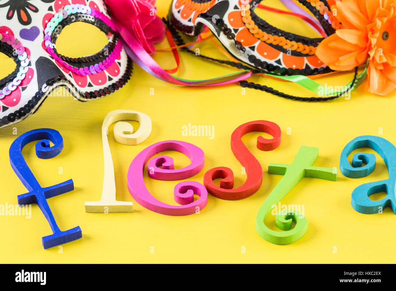 Word Fiesta on a bright painted wood background Stock Photo - Alamy