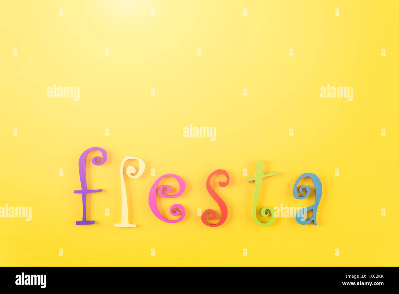 Word Fiesta on a bright painted wood background Stock Photo - Alamy