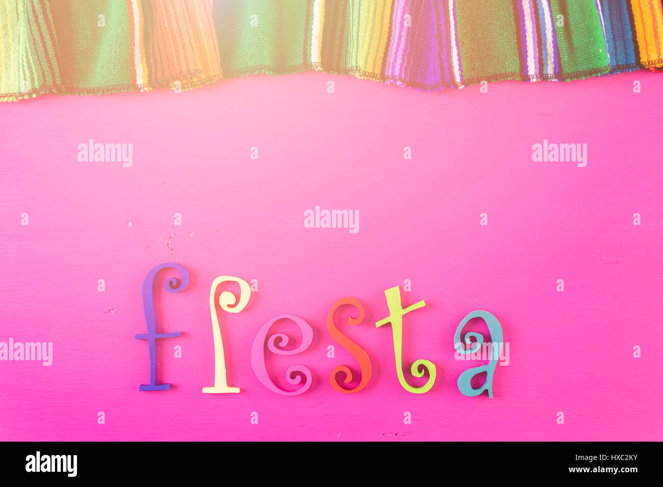 Word Fiesta on a bright painted wood background Stock Photo - Alamy