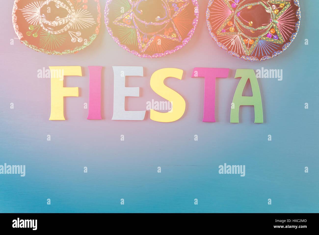 Word Fiesta on a bright painted wood background Stock Photo - Alamy