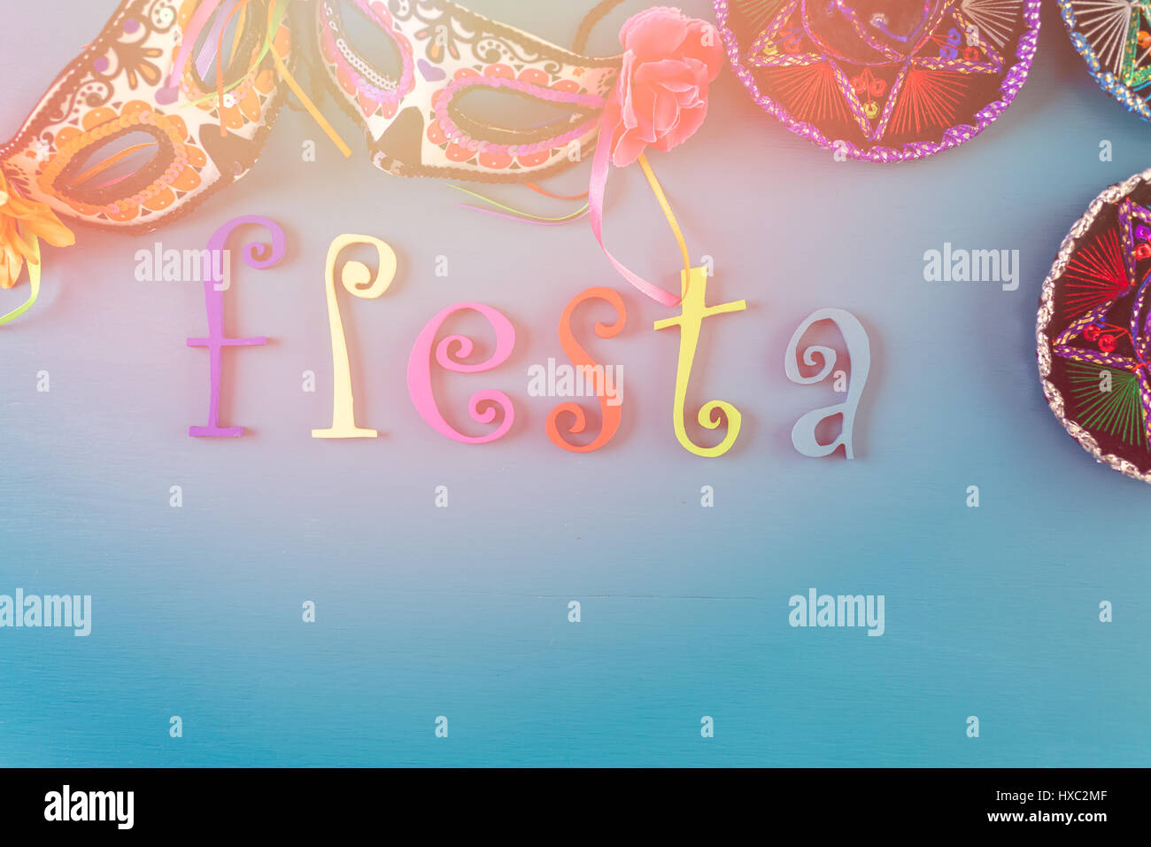 Word Fiesta on a bright painted wood background Stock Photo - Alamy