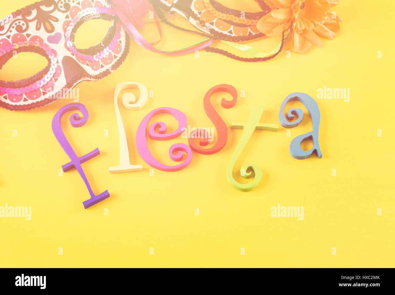 Word Fiesta on a bright painted wood background Stock Photo - Alamy