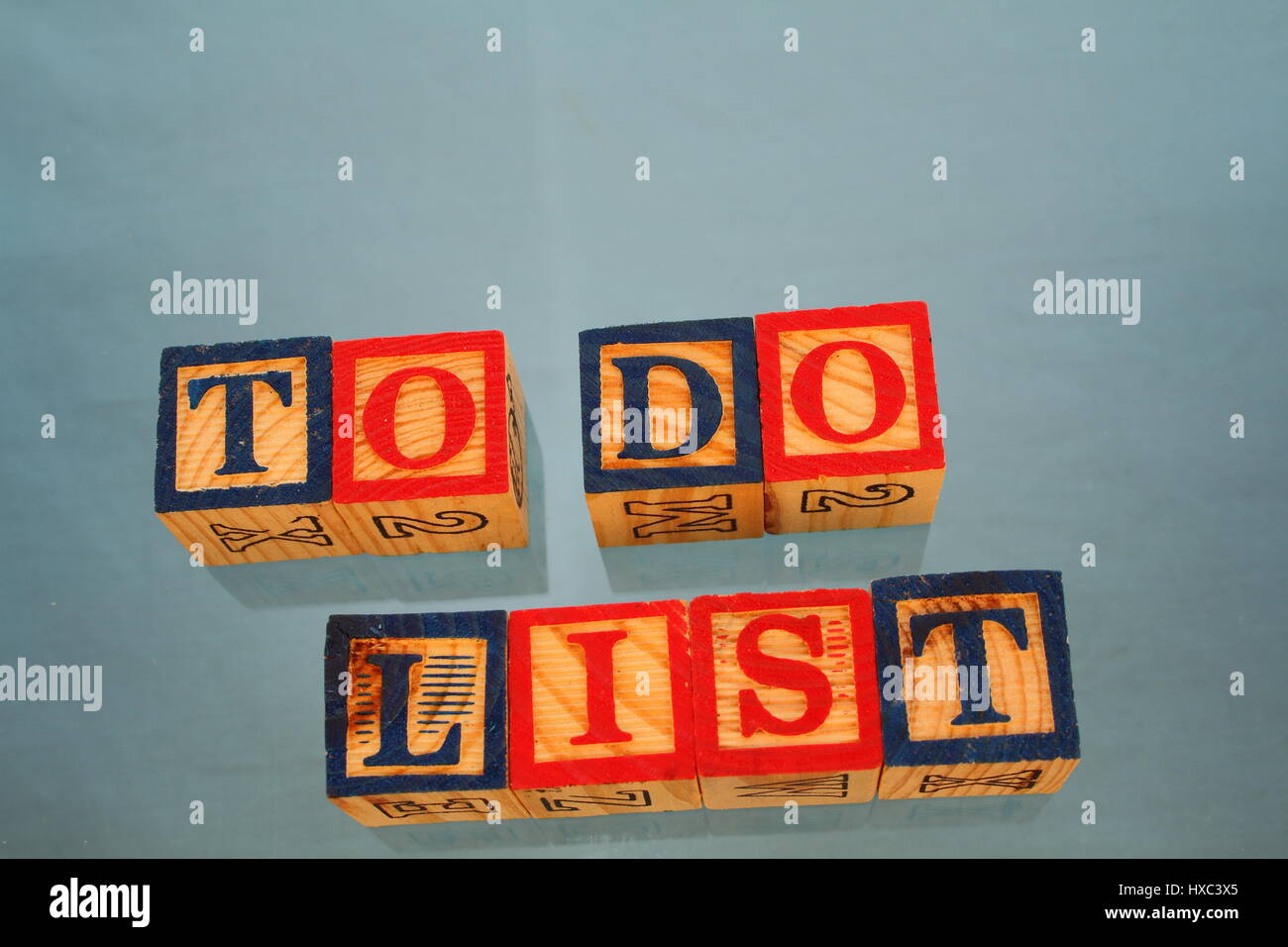 The phrase to-do-list visually displayed on a soft blue background ...