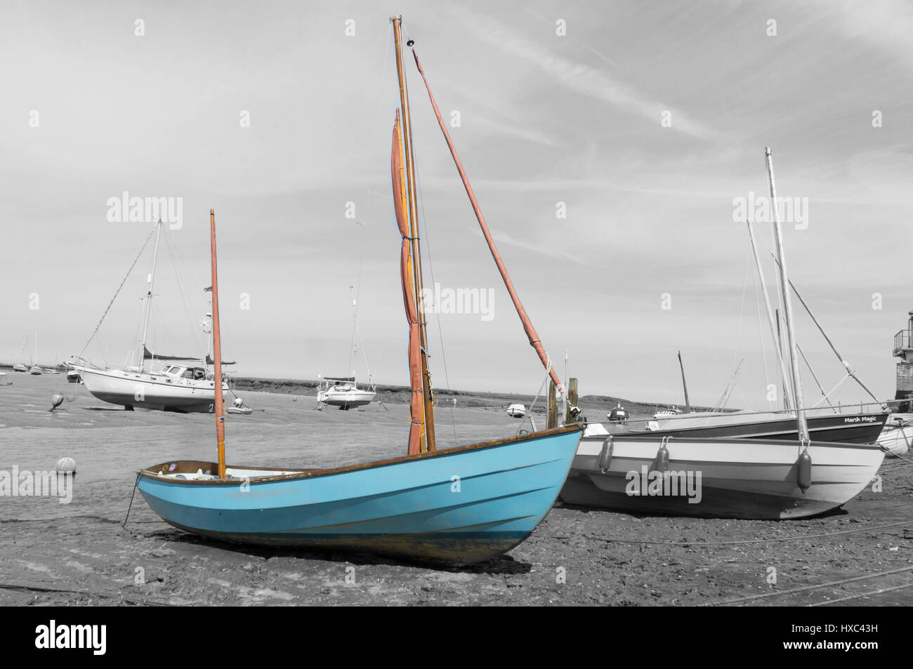 Norfolk coastline a inlet for boats Stock Photo - Alamy