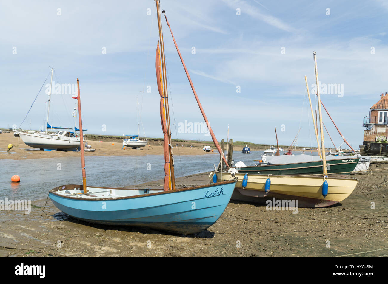 Norfolk coastline a inlet for boats Stock Photo - Alamy
