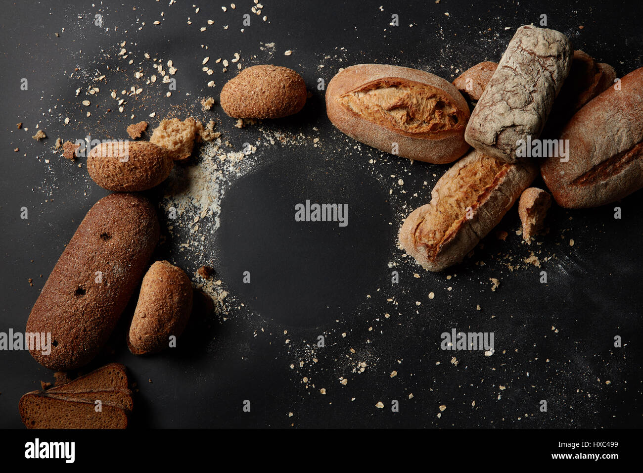Food industry concept. Different bread sorts represented in form of ...