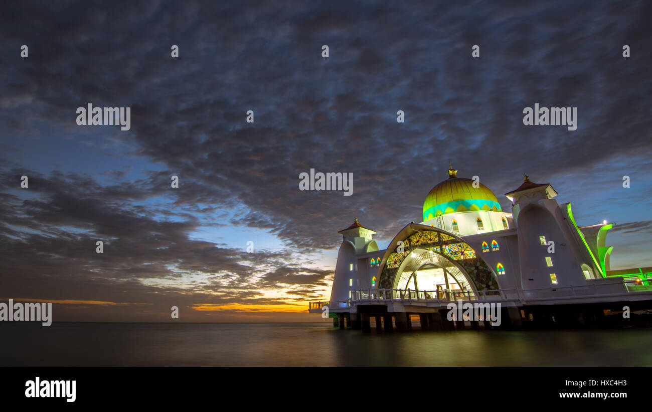 The floating mosque of Pulau Melaka, Malaysia as the sun sets behind it ...