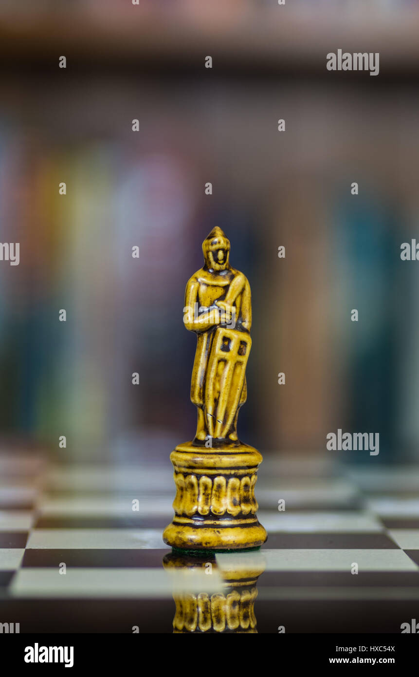 Ornate Chess pieces in focus with soft focus colourful background Stock ...
