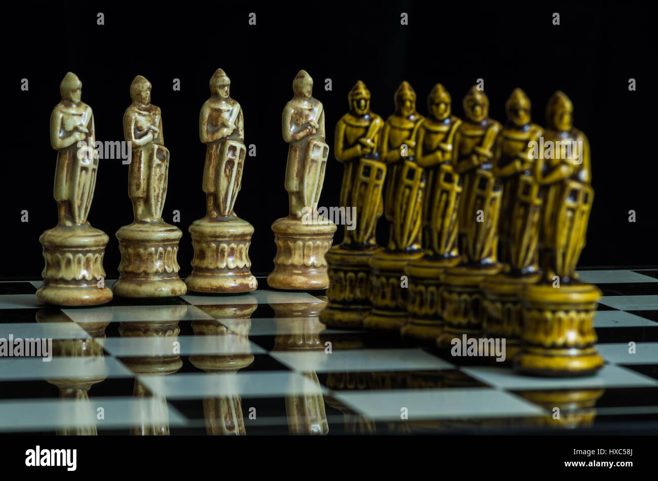 Ornate Chess pieces arranged with black background Stock Photo - Alamy