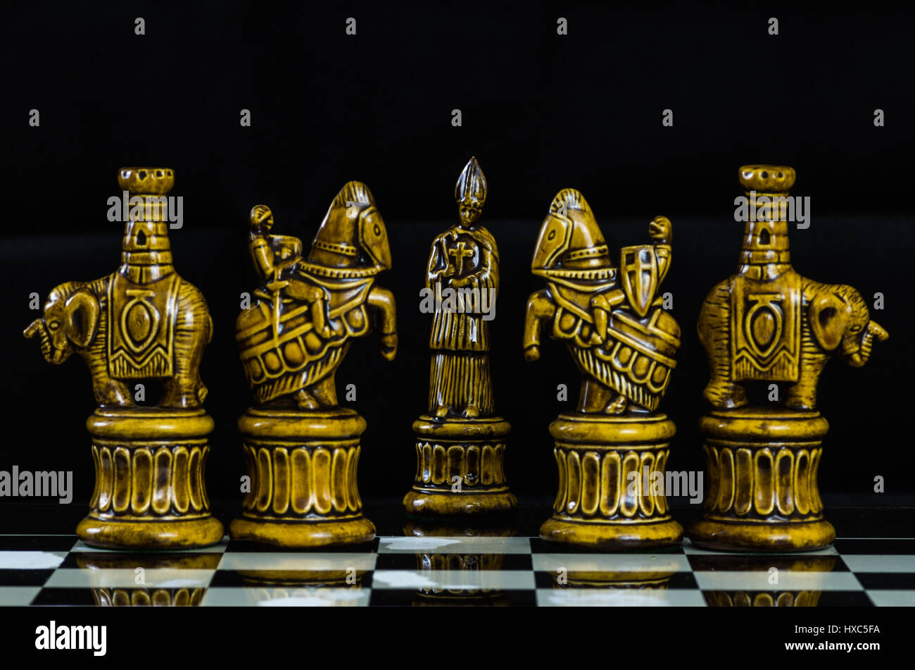 Ornate Chess pieces arranged with black background Stock Photo - Alamy