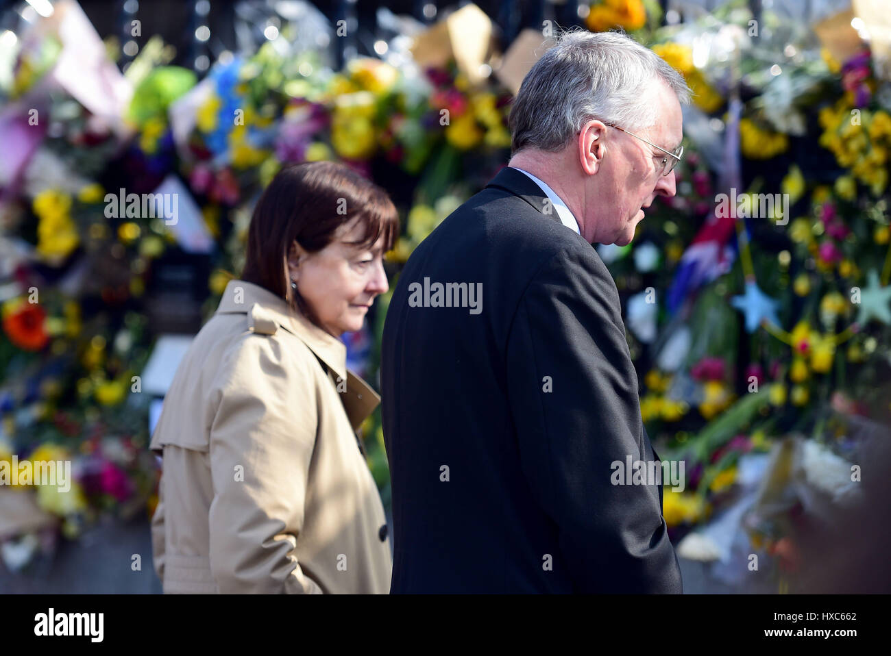 Labour MP Hilary Benn and his wife Sally leave a floral tribute to the ...