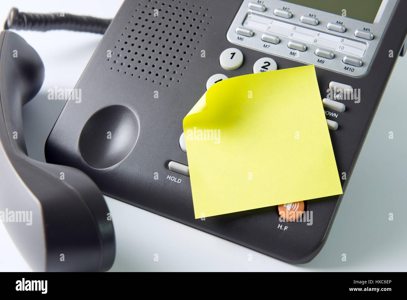 Blank post it note pad on landline telephone Stock Photo - Alamy