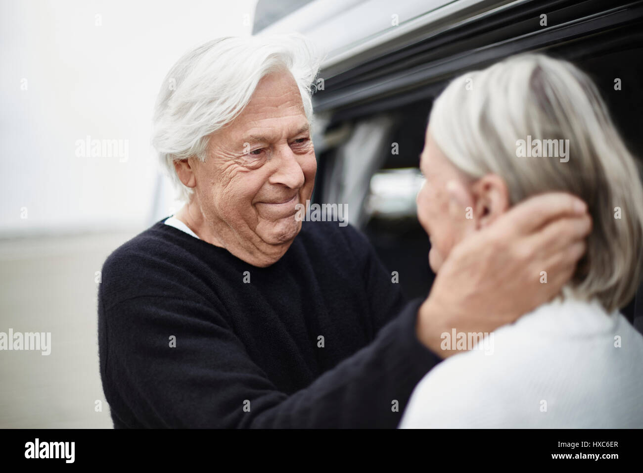 Affectionate senior couple face to face Stock Photo - Alamy