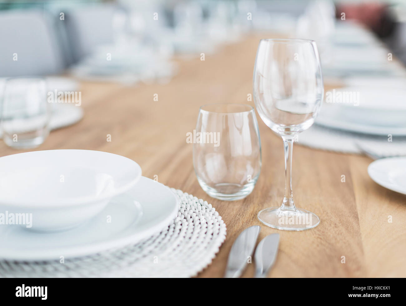 Still life simple placesetting on wood dining table Stock Photo - Alamy