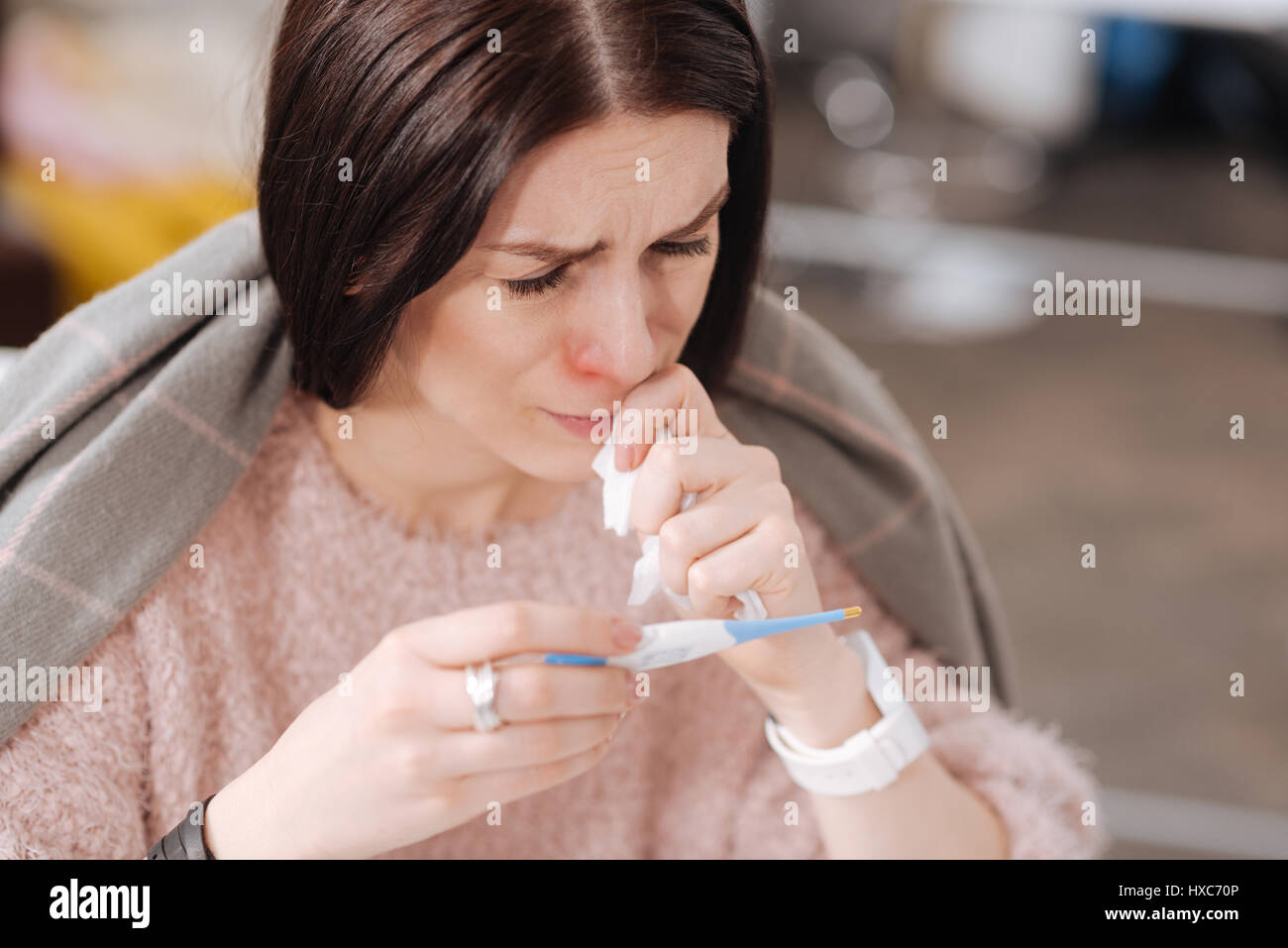 Upset woman worrying about her health Stock Photo - Alamy