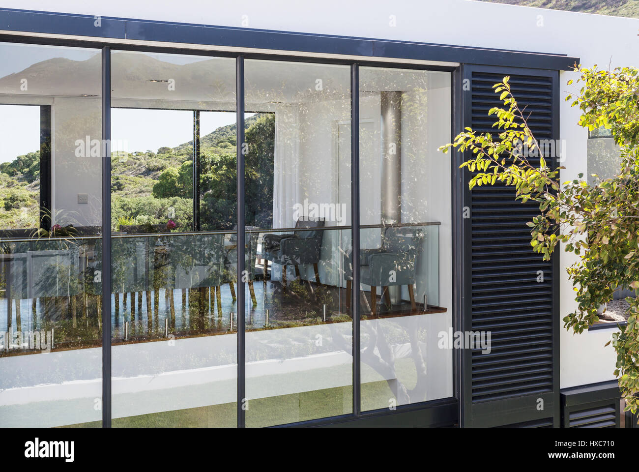 Home showcase exterior dining room windows Stock Photo - Alamy